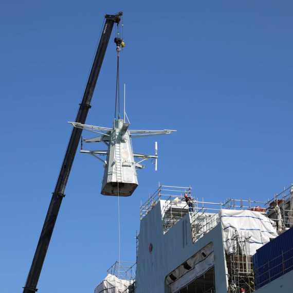 Installing the Forward Mast onto Ship 2 - Irving Shipbuilding