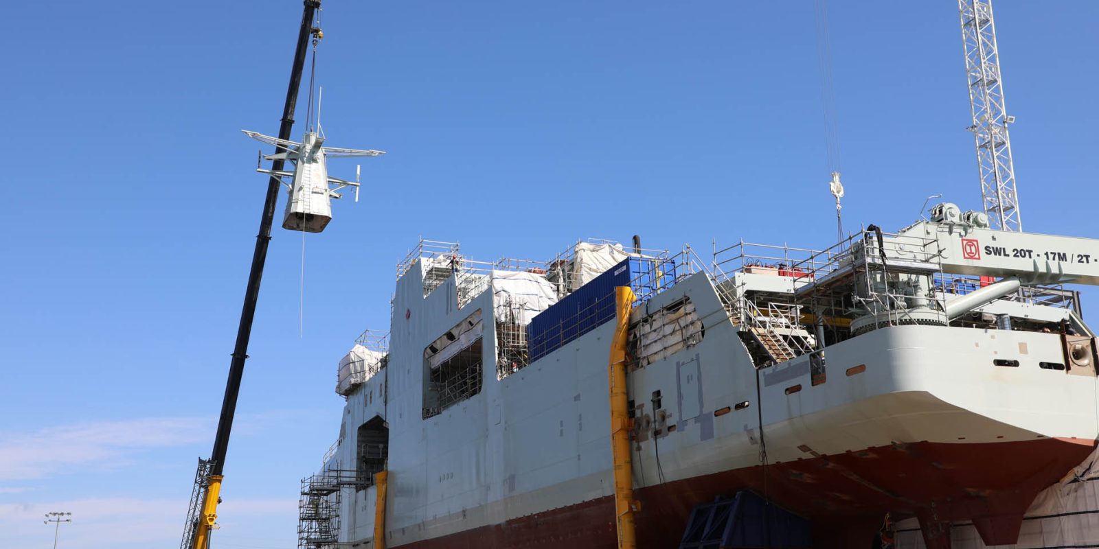 Installing the Forward Mast onto Ship 2 - Irving Shipbuilding